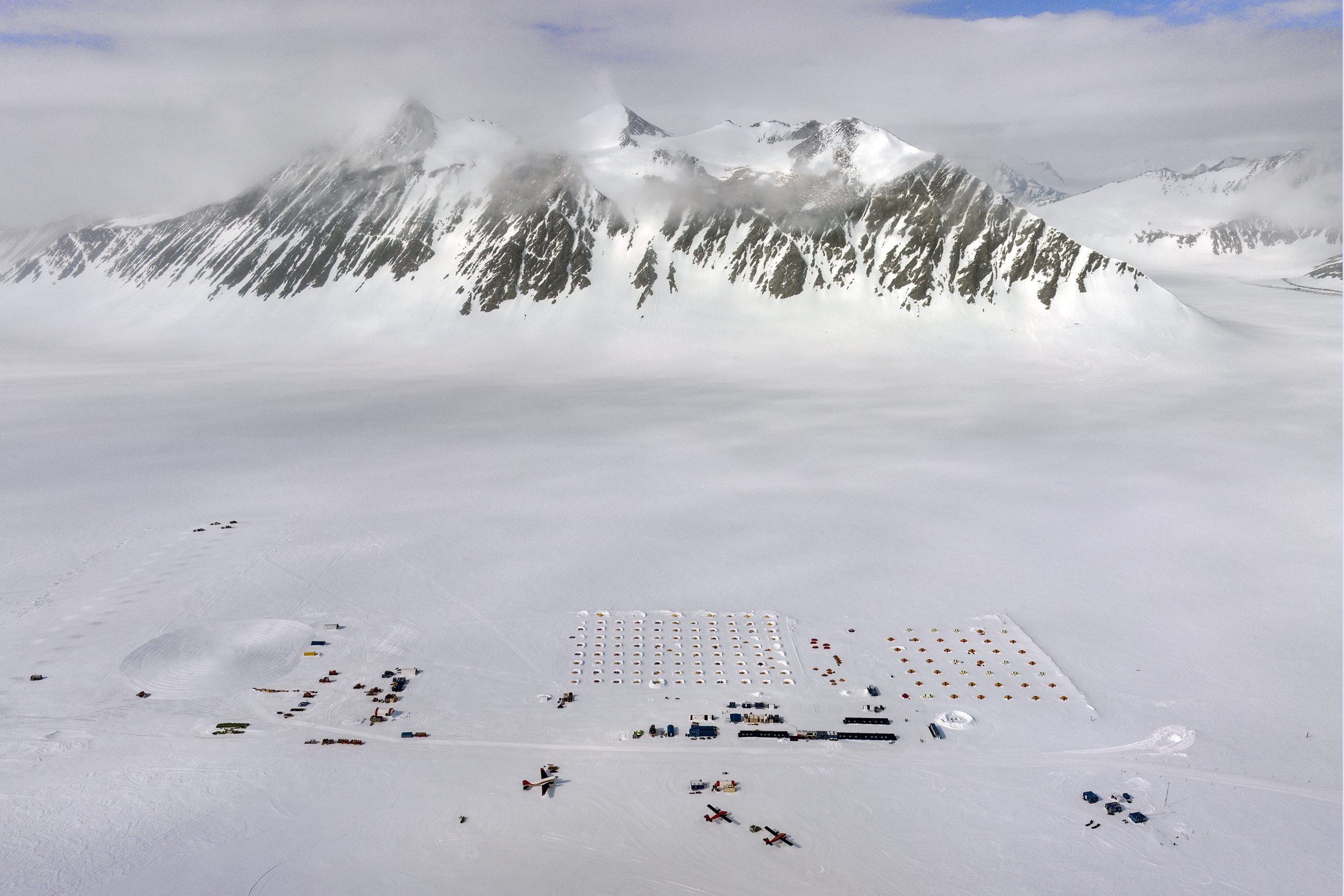 Aerial view of Union Glacier Camp, with Mount Rossman behind ...